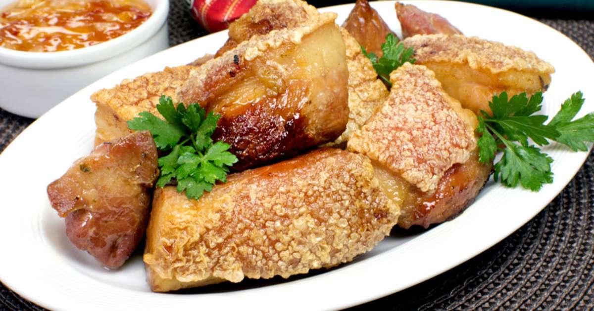 Leitoa pururuca desossada com geleia de abacaxi e pimenta