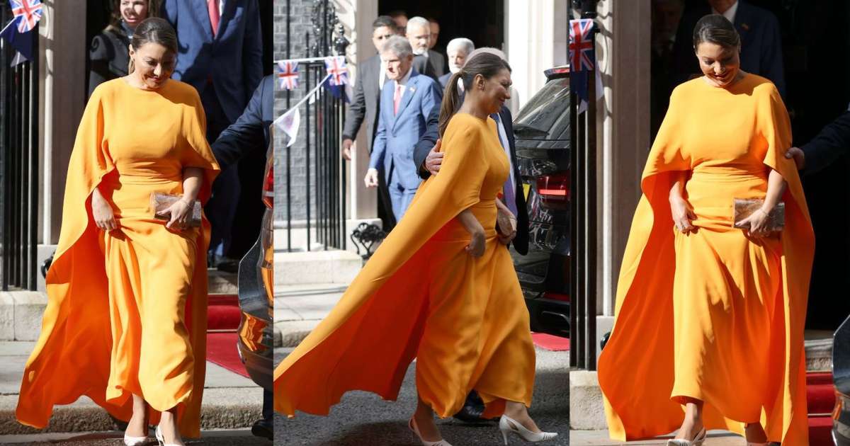 Janja escolhe vestido longo laranja com capa em evento com Lula antes ...