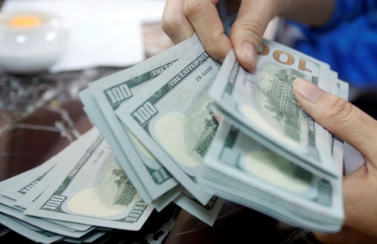 Brasil registrou saída de US$4,605 bi em março até dia 13 sob ...